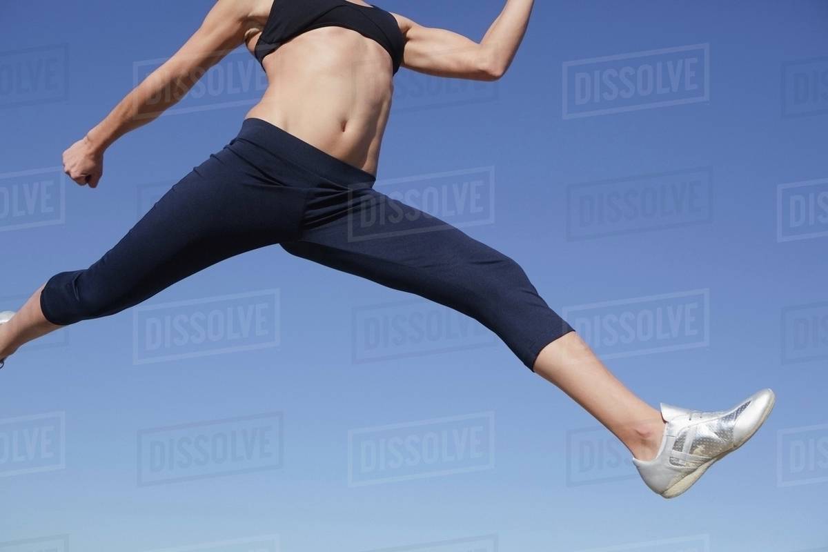 Woman Leaping - Royalty-free Stock Photo | Dissolve