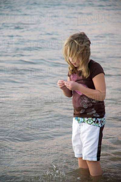 Girl Wading In The Water - Royalty-free Stock Photo | Dissolve