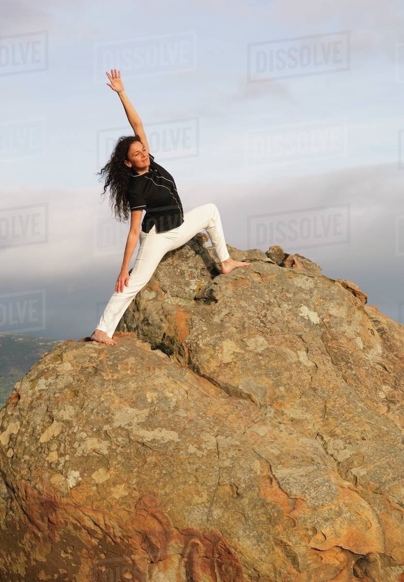 Woman In Yoga Position On Large Boulder - Royalty-free Stock Photo ...