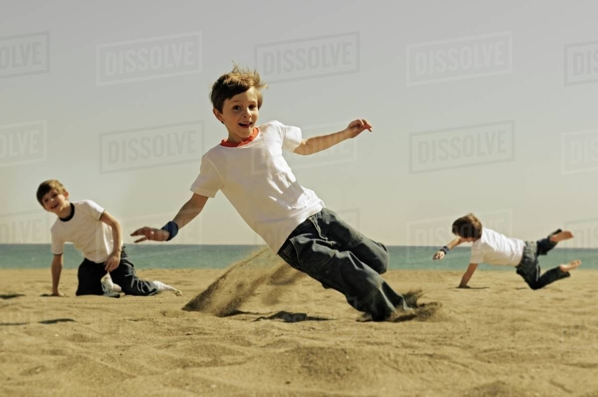 Playing In The Sand - Royalty-free Stock Photo | Dissolve