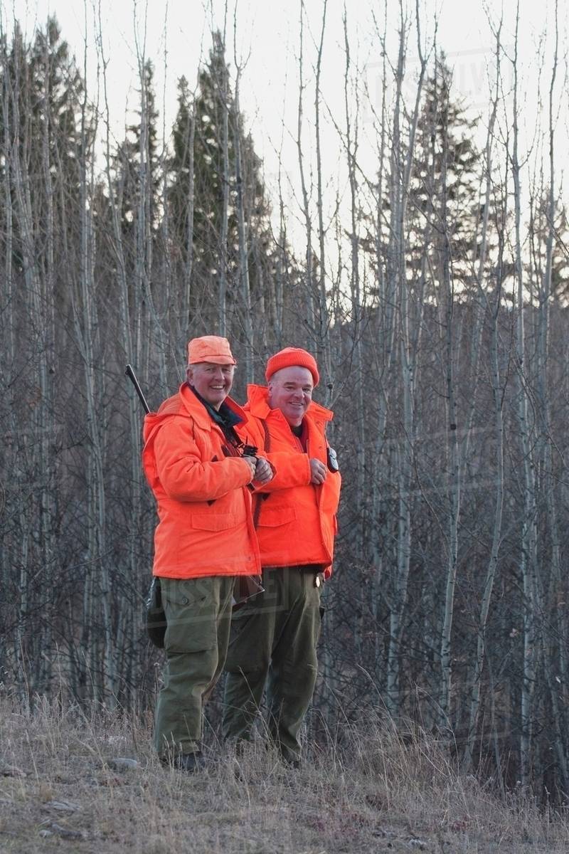 Two Men Ready To Hunt - Stock Photo - Dissolve