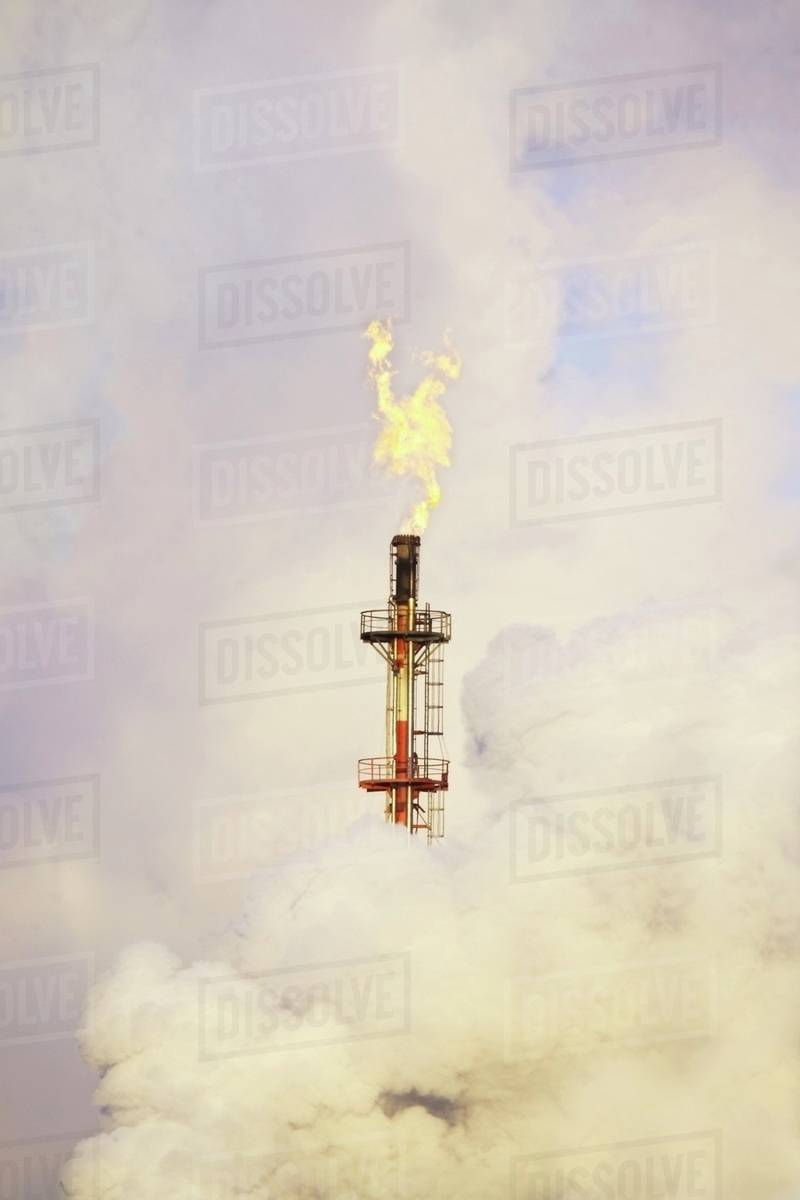 Oil Refinery Chimney - Royalty-free Stock Photo | Dissolve