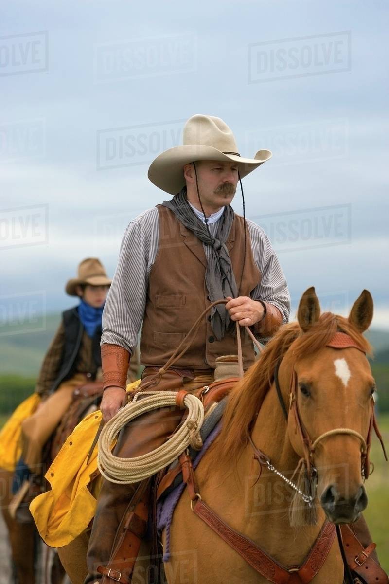 Cowboys On Horseback, Southern Alberta, Canada - Royalty-free Stock ...