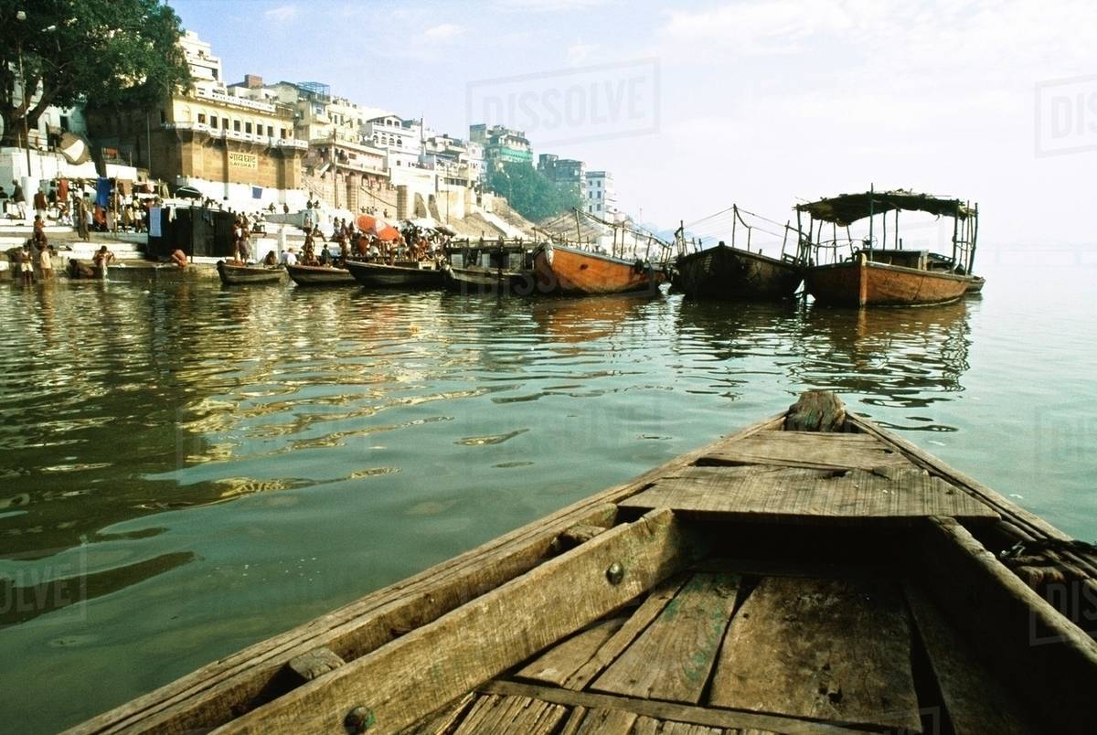 Boats On The Ganges River, India - Stock Photo - Dissolve
