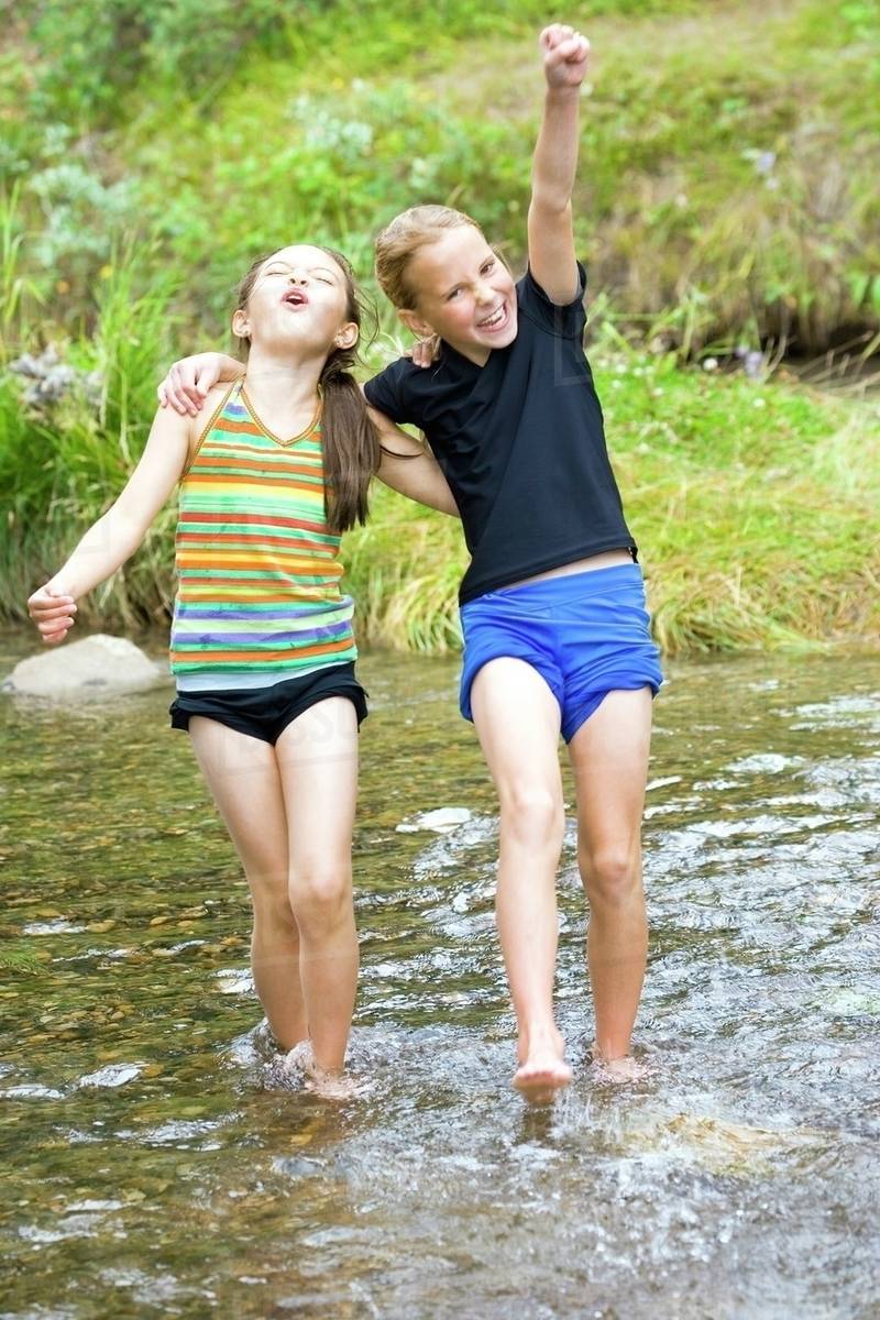 Children Playing In Stream - Royalty-free Stock Photo | Dissolve