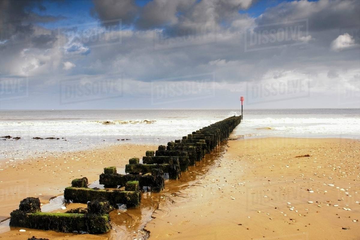 Jetty On Beach, Yorkshire, England - Royalty-free Stock Photo | Dissolve