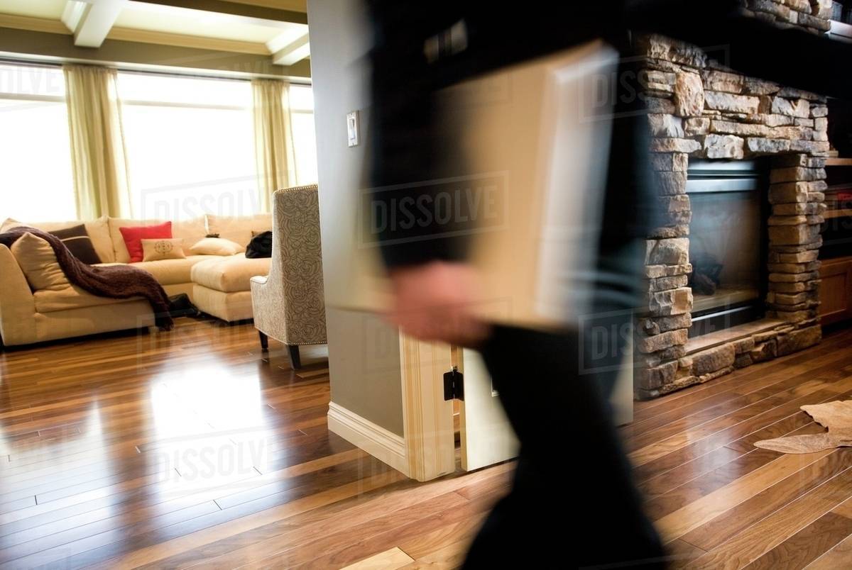 Person Walking Through House - Royalty-free Stock Photo | Dissolve