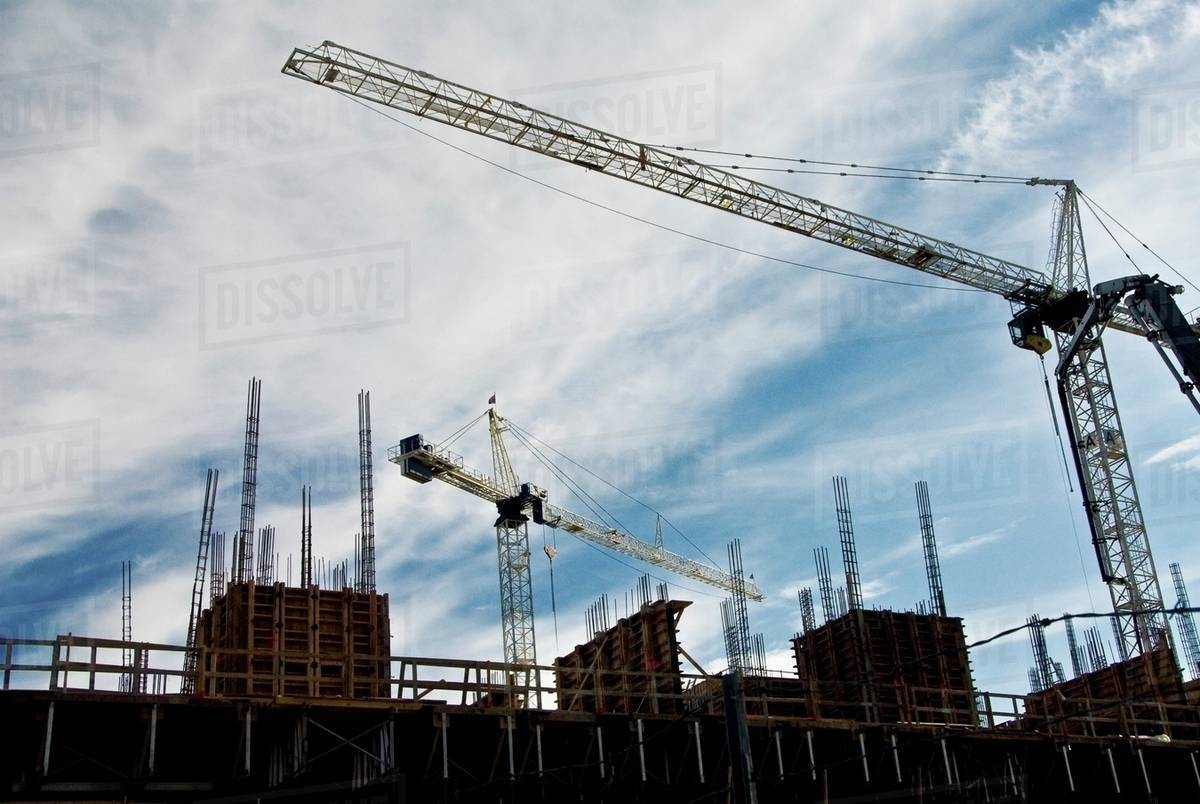 Cranes At Work - Royalty-free Stock Photo | Dissolve