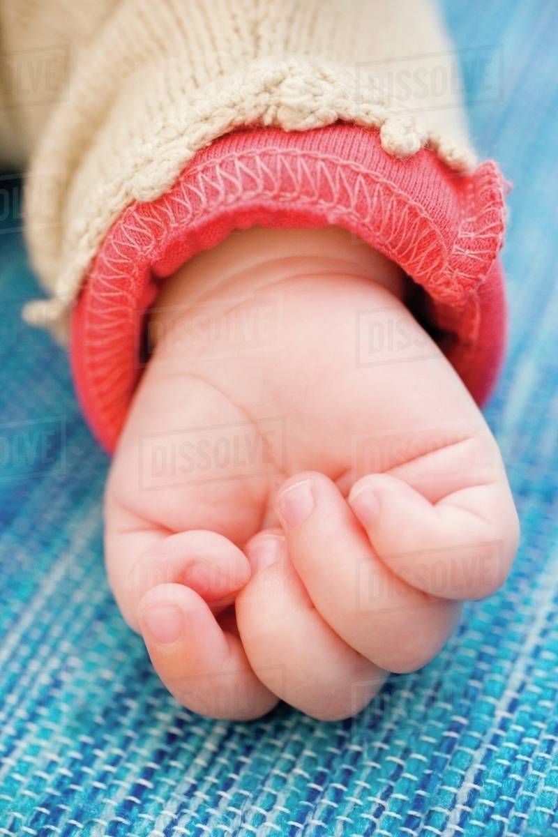 Baby Hand - Stock Photo - Dissolve