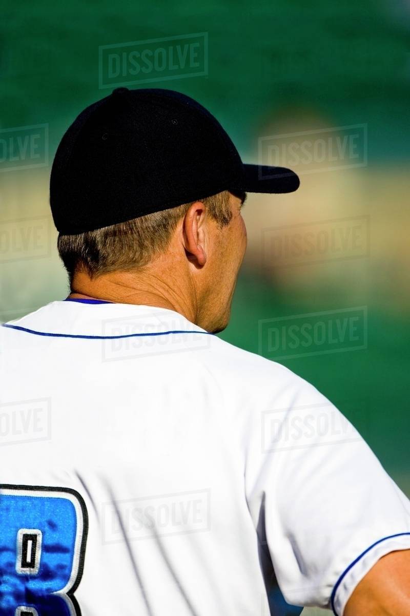 Rear View Of A Baseball Player - Stock Photo - Dissolve