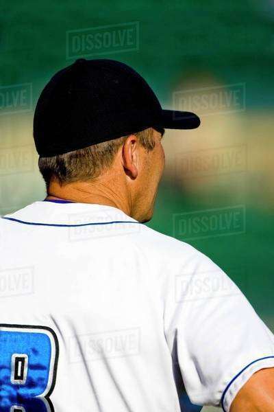 Rear View Of A Baseball Player - Stock Photo - Dissolve