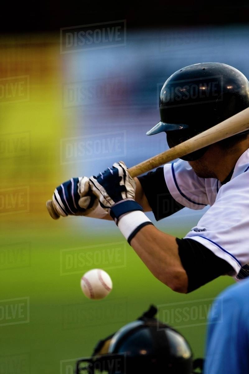 Man Playing Baseball - Royalty-free Stock Photo | Dissolve