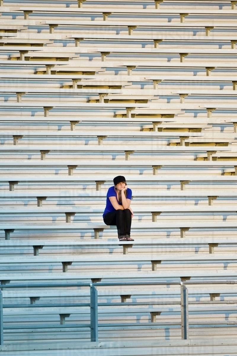 Person On Bleachers - Royalty-free Stock Photo | Dissolve