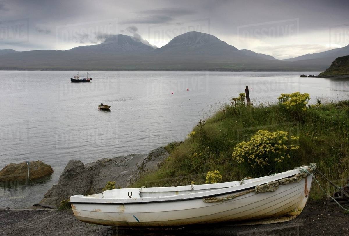 Boats On The Water And On The Shore - Royalty-free Stock Photo | Dissolve