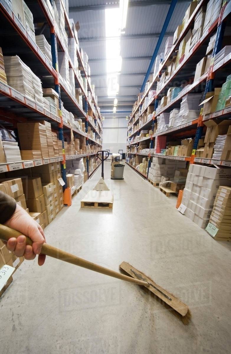 Sweeping The Warehouse - Royalty-free Stock Photo | Dissolve