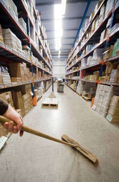 Sweeping The Warehouse - Royalty-free Stock Photo | Dissolve