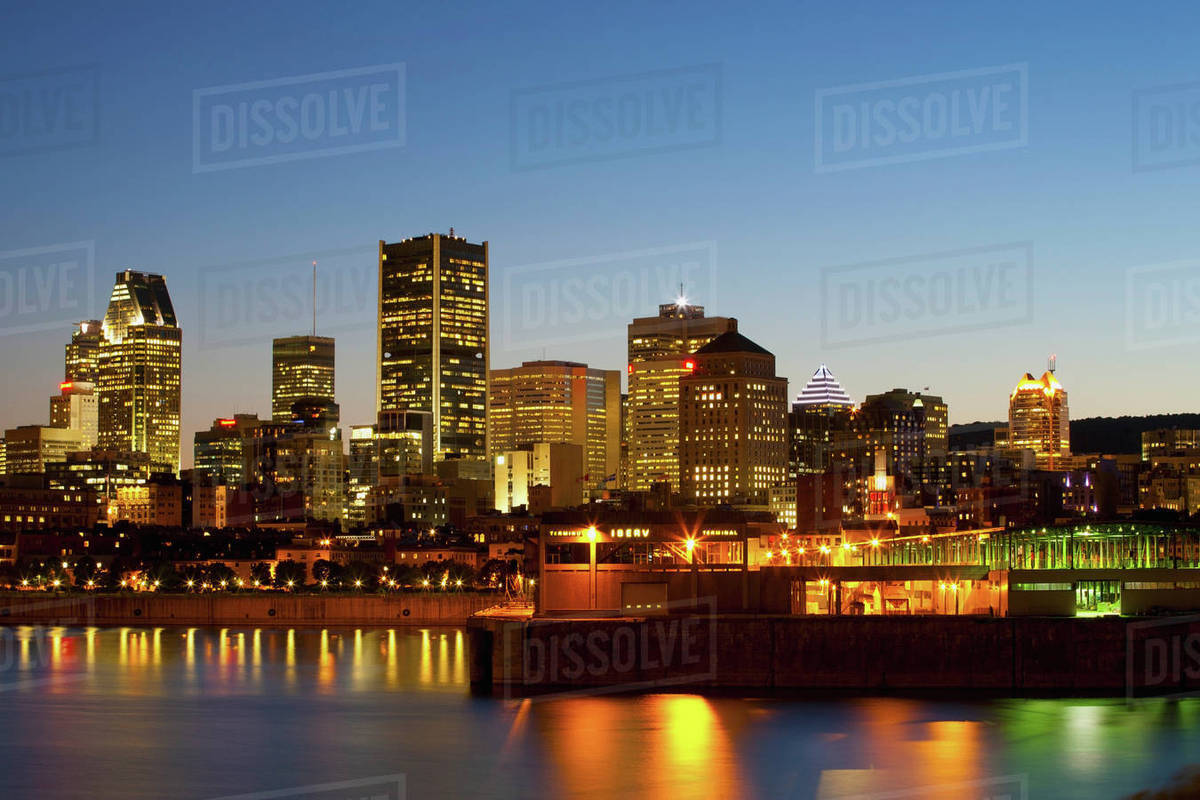 Montreal Skyline At Dusk; Montreal, Quebec, Canada - Stock Photo - Dissolve