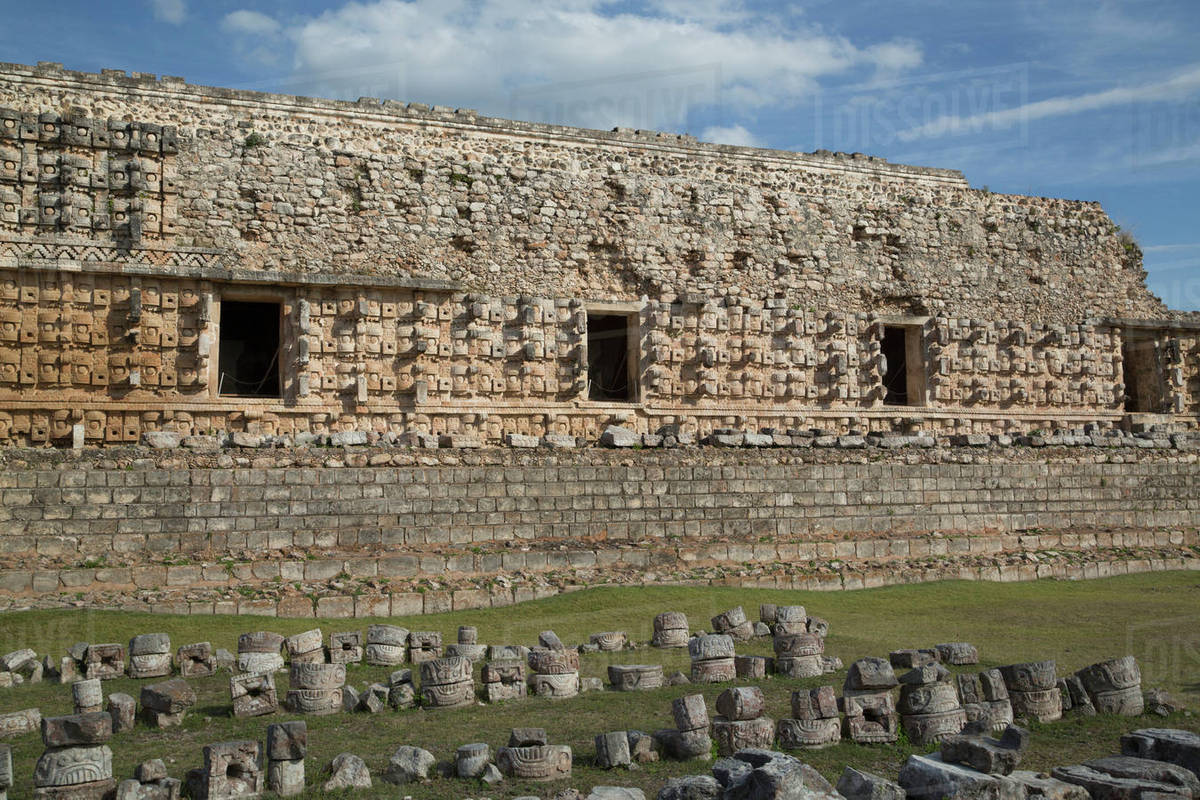 Stone glyphs in front of the Palace of Masks, Kabah archaeological site ...