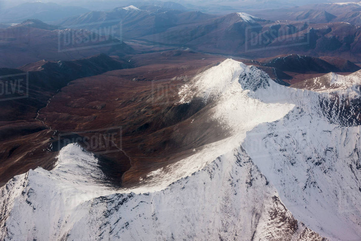 Snow Covered Peaks In The Brooks Range In Winter; Alaska, United States ...