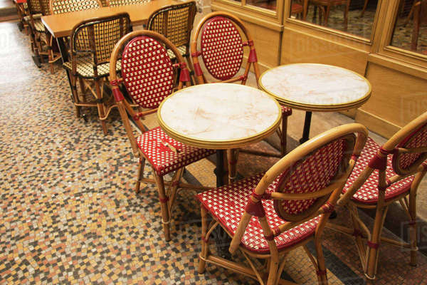 Traditional Bistro Tables And Chairs On A Sidewalk; Paris, France ...
