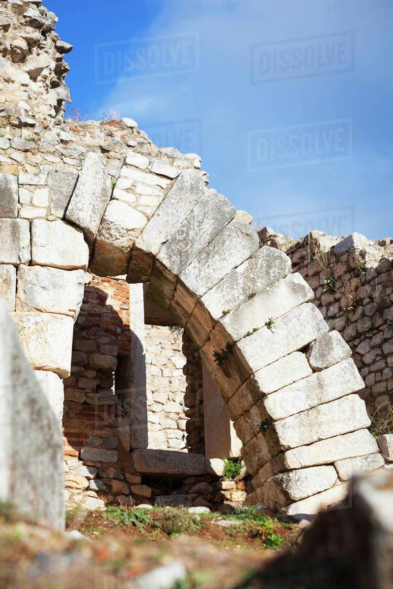 Ruined Stone Walls And Arches; Philippi, Greece - Stock Photo - Dissolve