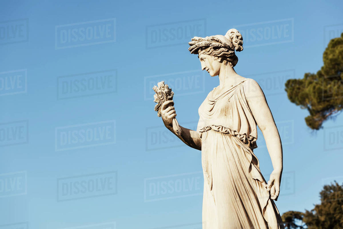 Statue Of Female Figure Against A Blue Sky; Rome, Italy - Royalty-free ...