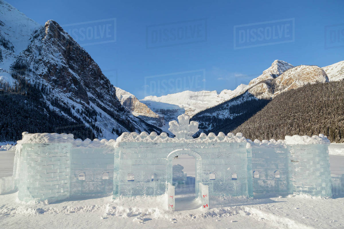 A Beautiful Ice Castle With A Canadian Flag Has Been Carved From Ice ...