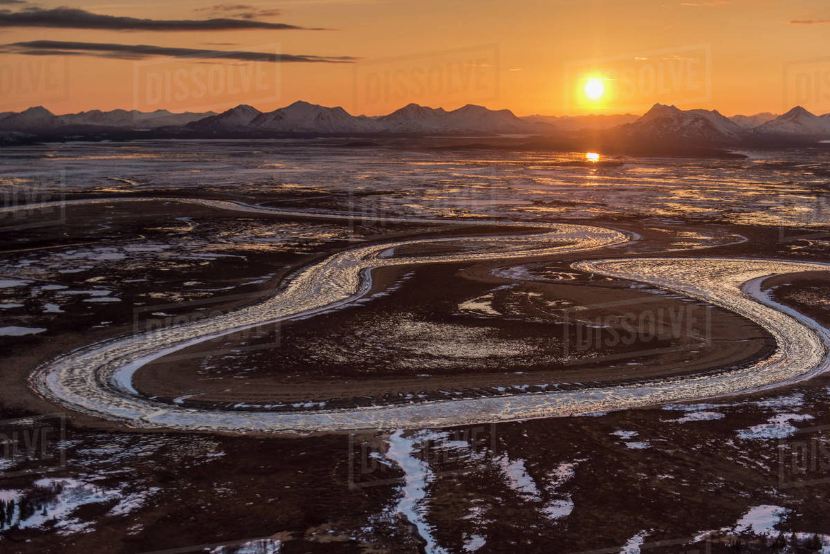 The Sun Sets Behind The Wood River Mountains And Snake River Within The ...