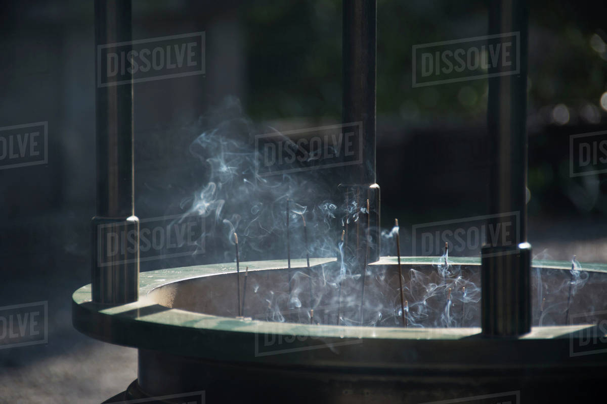 Close up of a large incense vase with smoking sticks; Ohara, Kyoto ...
