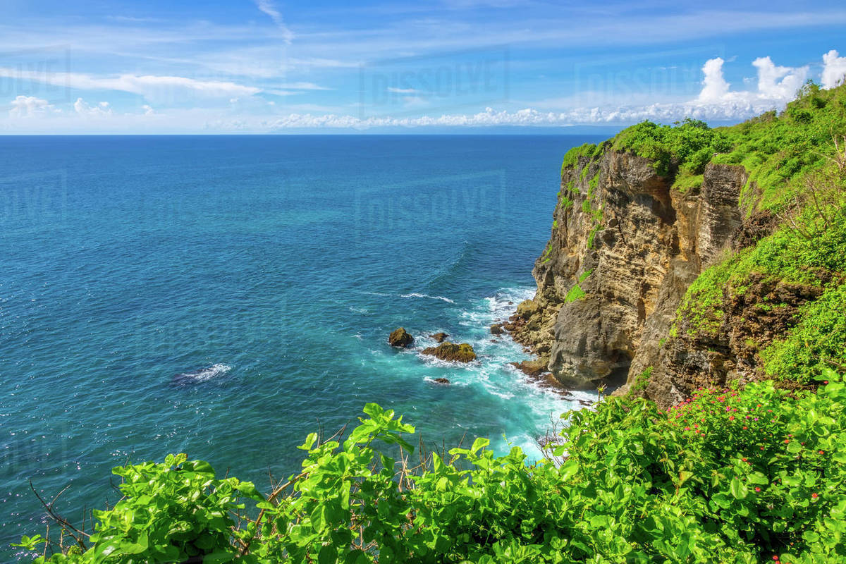 Indonesia. Rocky Coast of a Tropical Island and Sunny Day. - Stock ...
