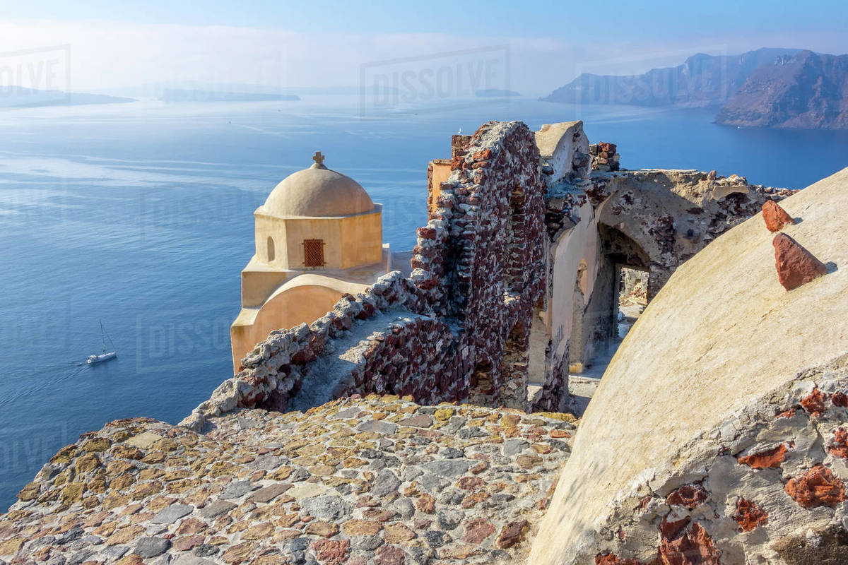Greece. Santorini (Thira) island in sunny weather. Church and old ruins ...