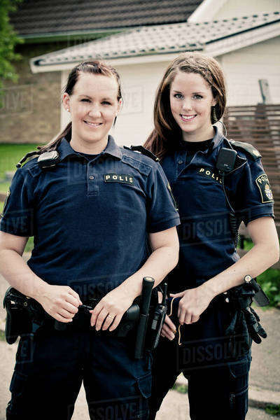 Portrait of two female police officers standing together - Stock Photo ...