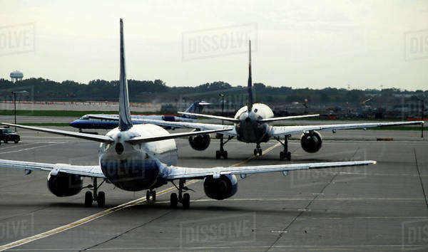 Airplane taxing - Stock Photo - Dissolve