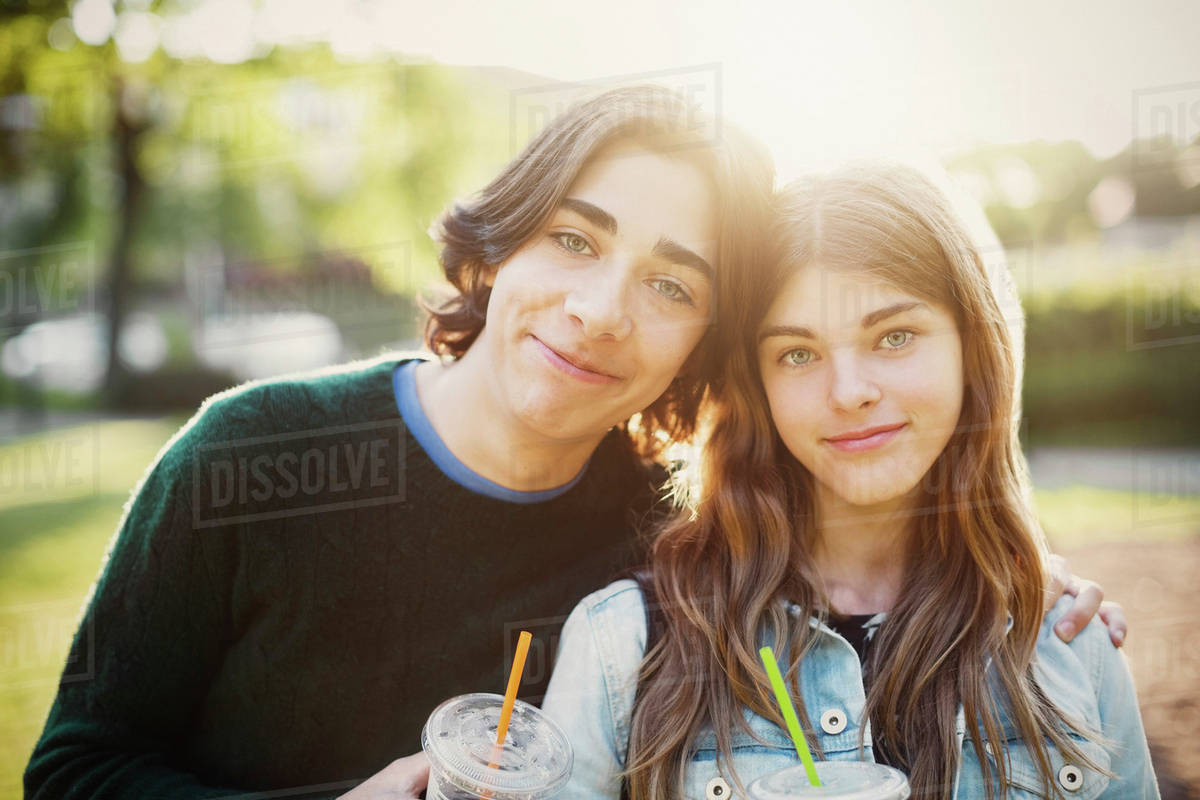 Portrait of smiling teenagers at park on sunny day - Royalty-free Stock ...