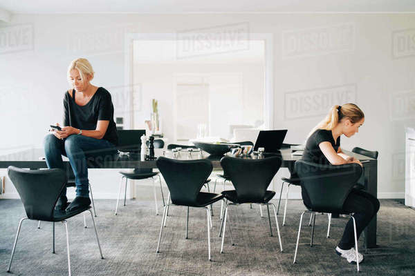 Family with dining table in room at home - Royalty-free Stock Photo ...