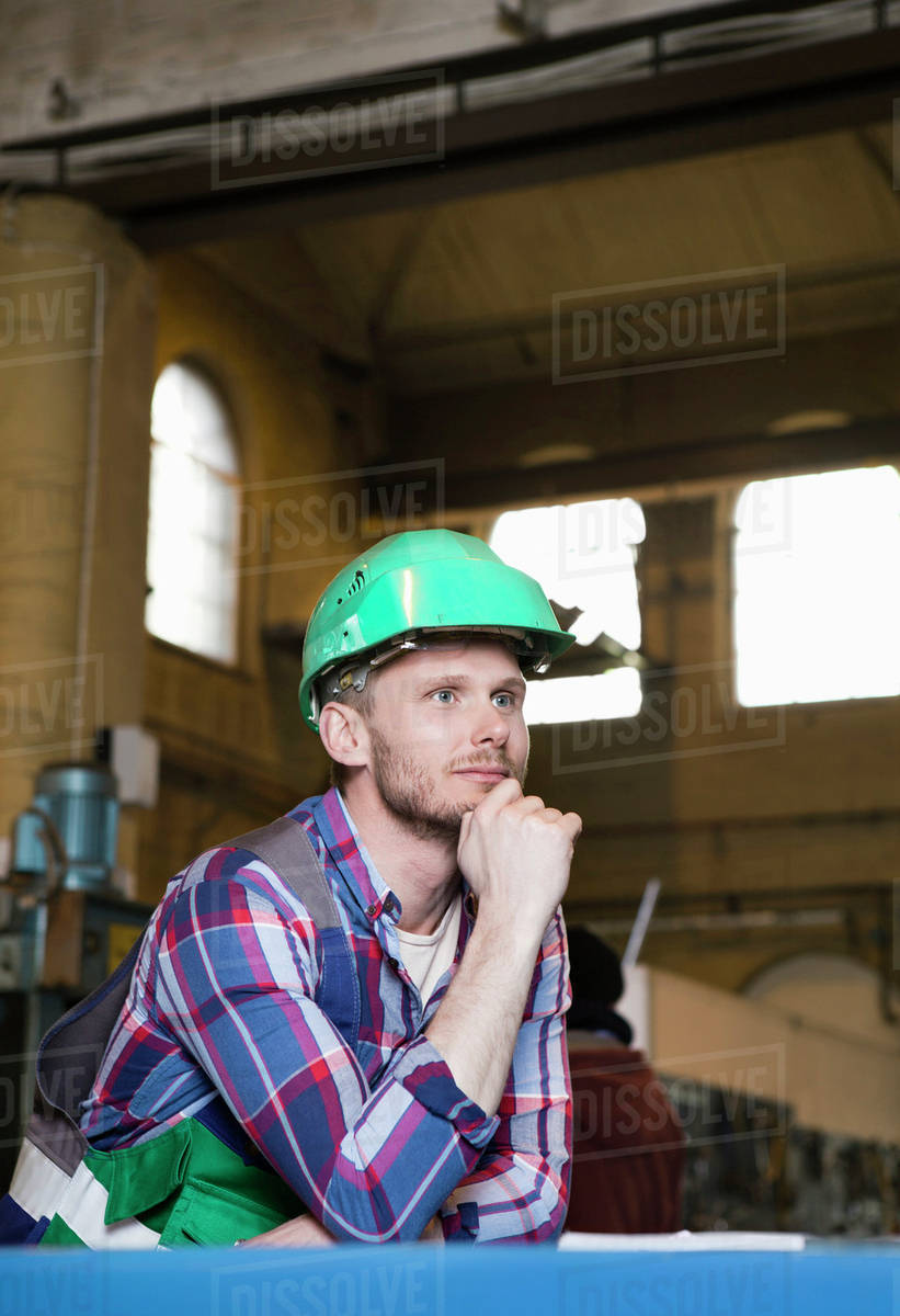 Man thinking at work - Stock Photo - Dissolve