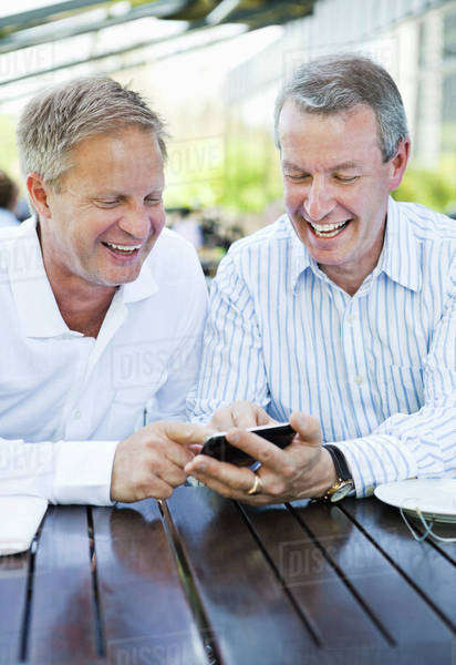 Two men laughing - Royalty-free Stock Photo | Dissolve