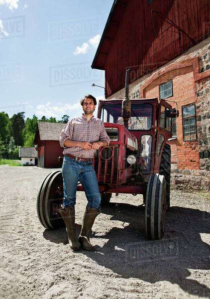 Farmer with tactor 3 - Royalty-free Stock Photo | Dissolve