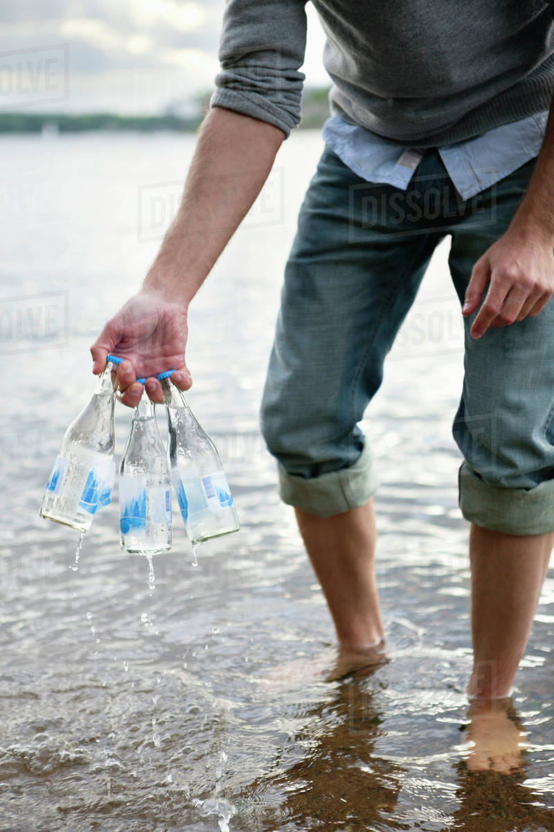Man getting water - Royalty-free Stock Photo | Dissolve