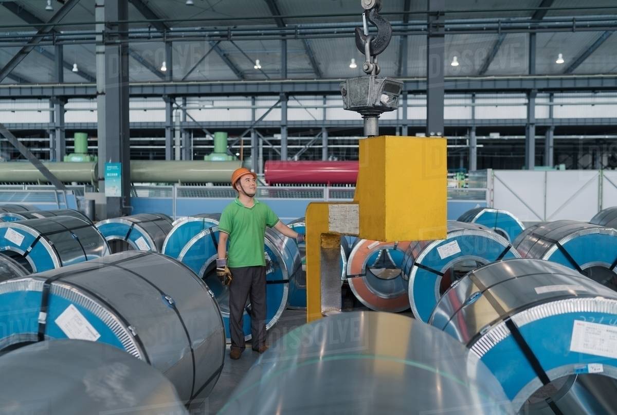 Worker in solar panel assembly factory, Solar Valley, Dezhou, China ...