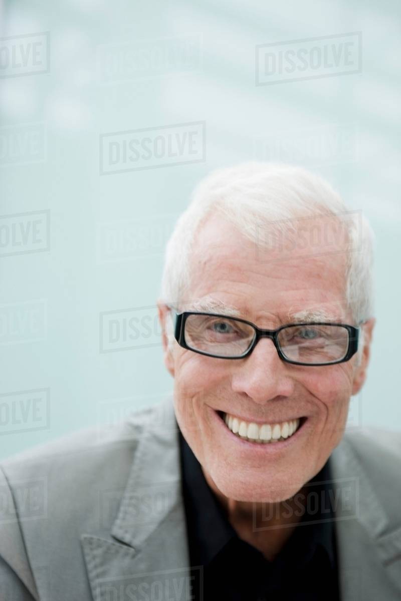 Older man smiling at viewer - Royalty-free Stock Photo | Dissolve