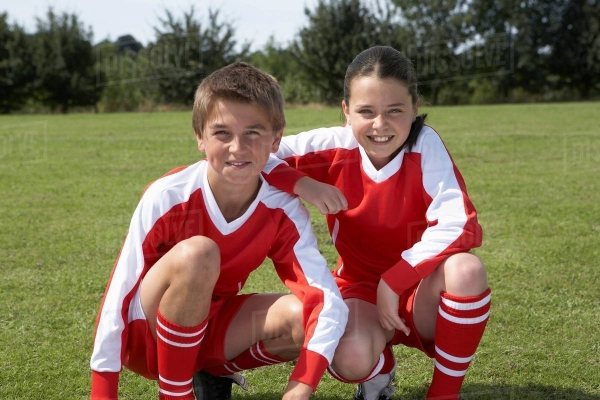 Two young footballers - Stock Photo - Dissolve