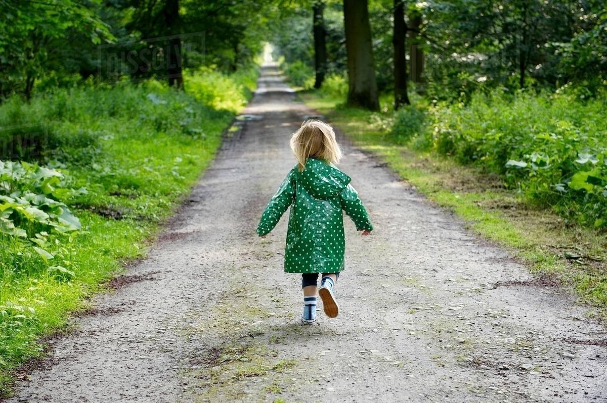 Girl running in the forest - Stock Photo - Dissolve