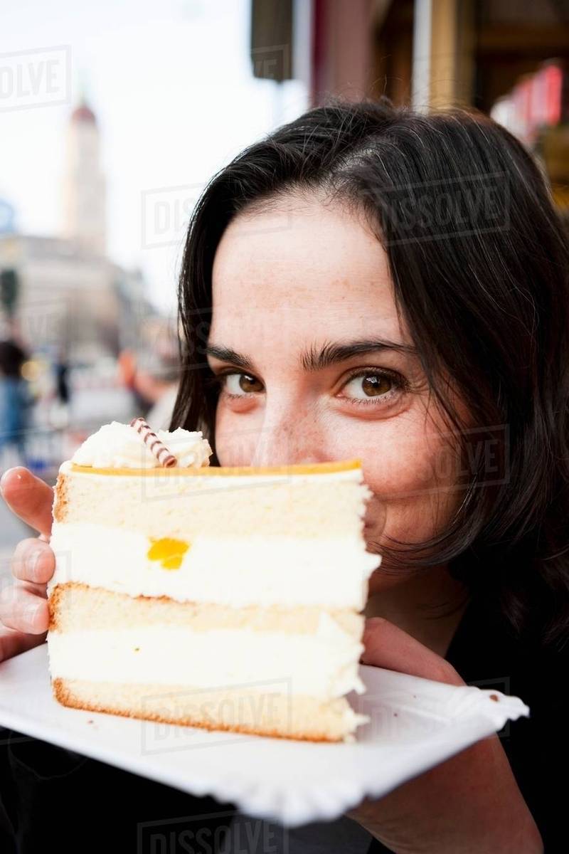 Woman Eating Tart - Royalty-free Stock Photo | Dissolve