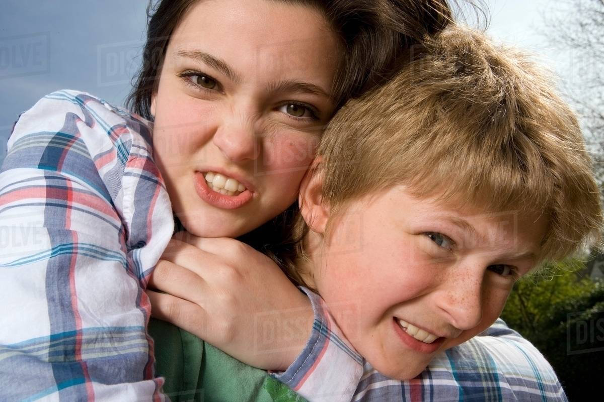 Children play fighting - Stock Photo - Dissolve