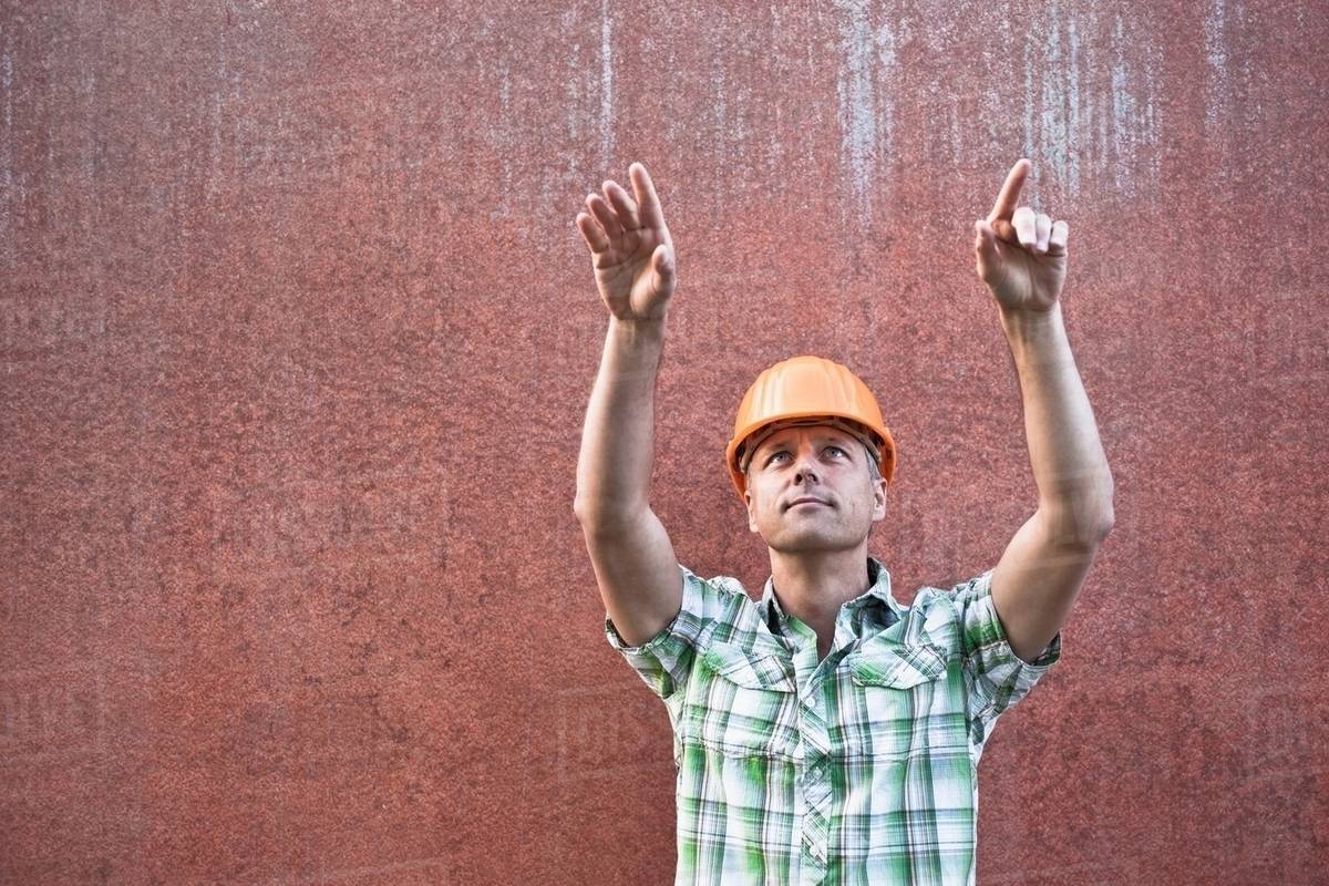 Construction Worker Directing - Royalty-free Stock Photo | Dissolve