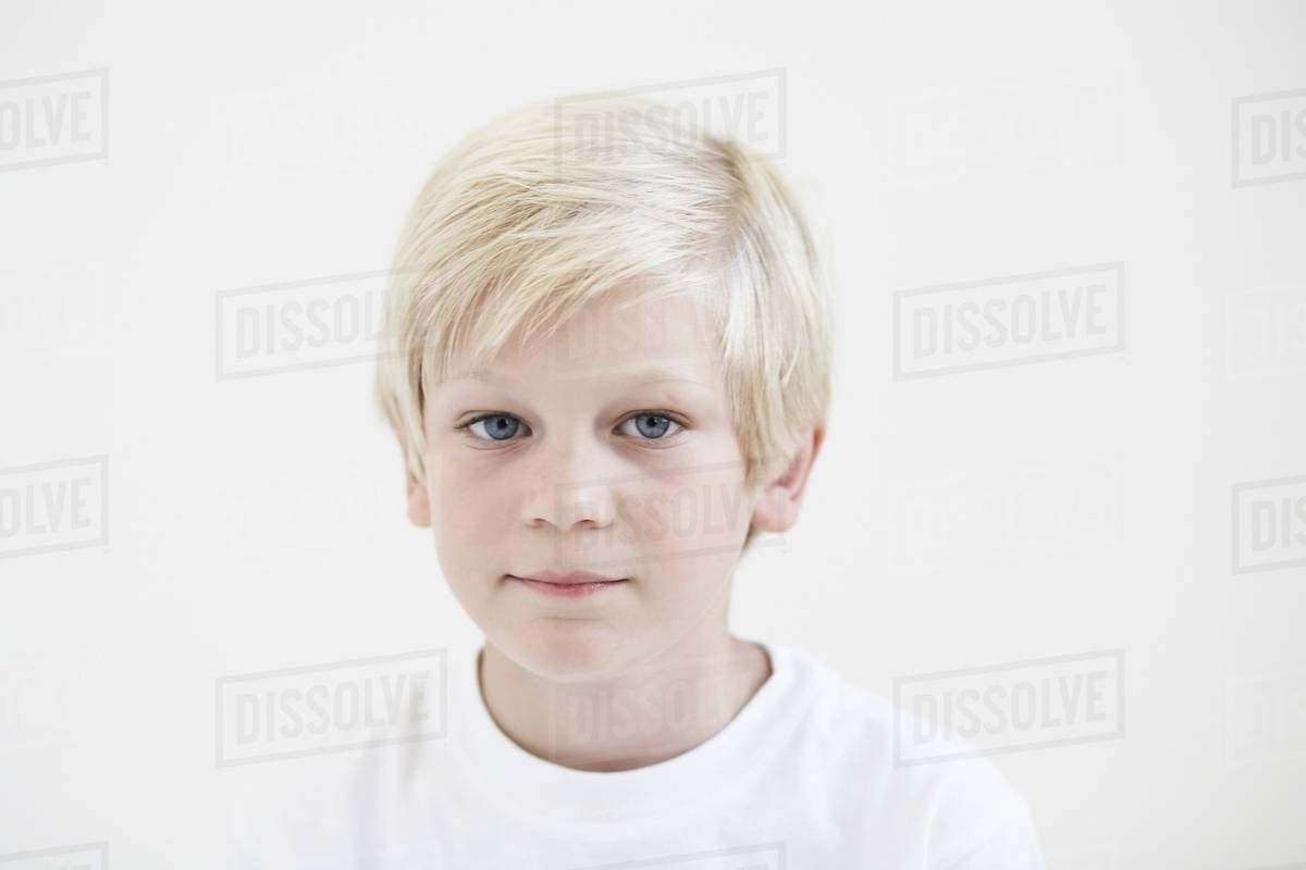 Portrait young boy looking to camera - Royalty-free Stock Photo | Dissolve