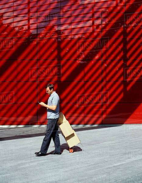 A courier delivers parcels - Royalty-free Stock Photo | Dissolve
