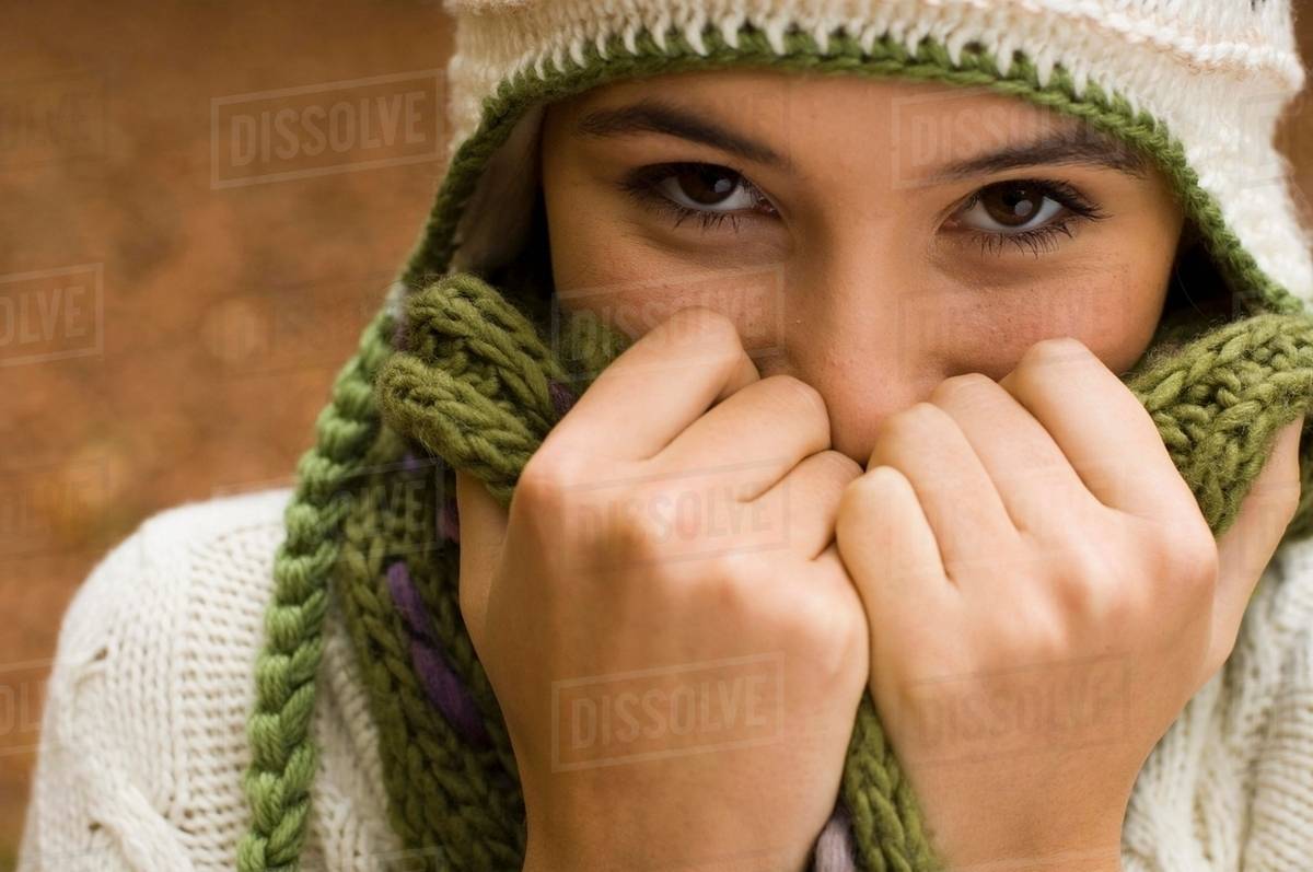 Close up hands and face - Stock Photo - Dissolve
