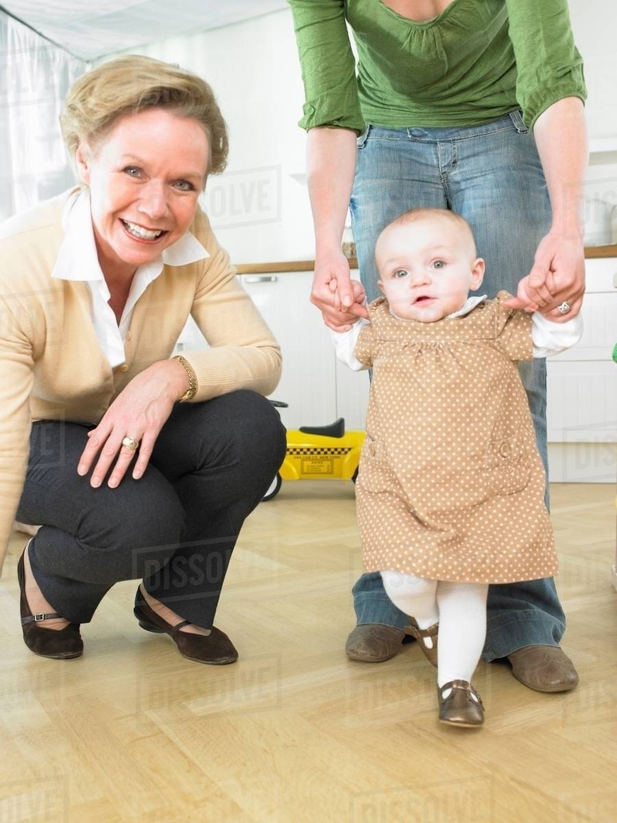 Baby learning to walk - Royalty-free Stock Photo | Dissolve